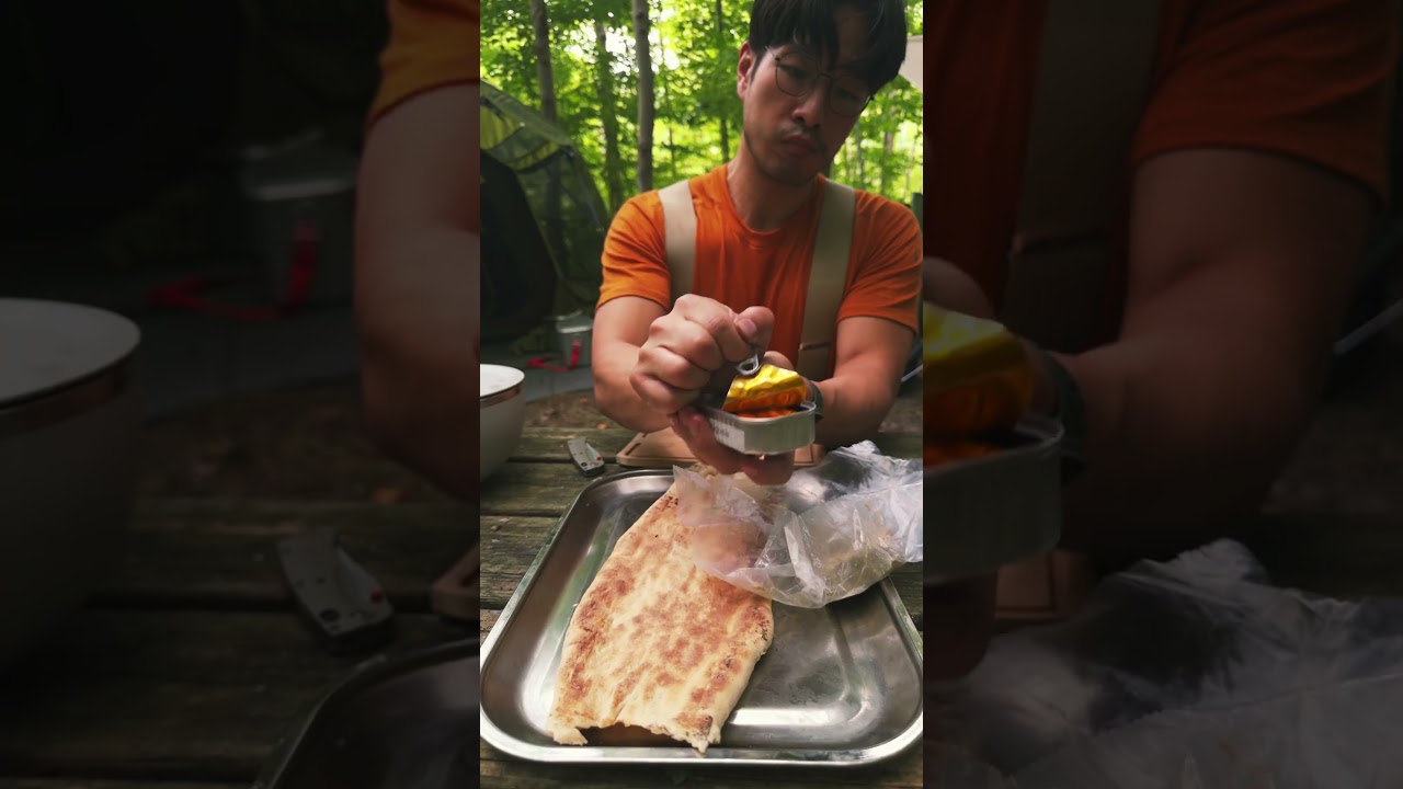 Campfire flatbread with cheese and tinned fish