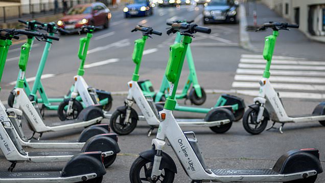 Woman rides electric scooter on Miami highway