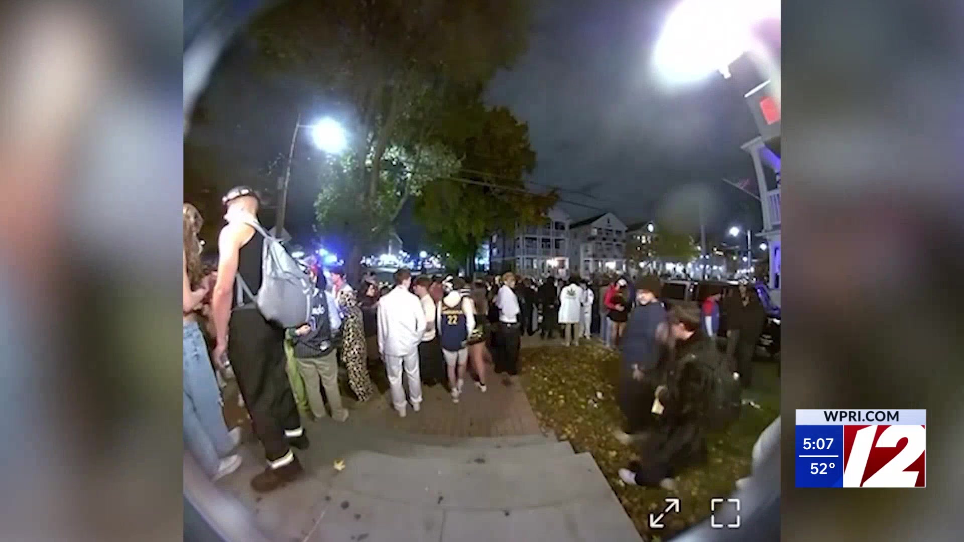 Rowdy crowds fill Eaton Street in Providence for a Halloween party