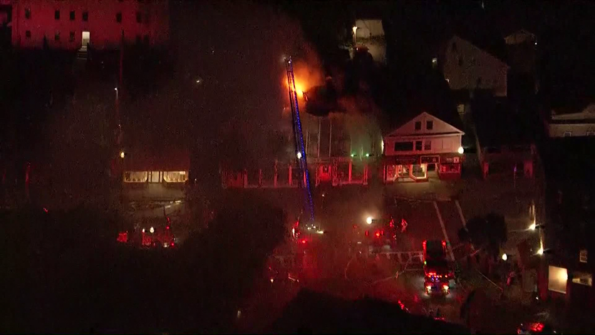 Crews battle massive fire at downtown Milford tavern