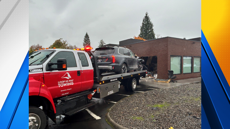 2 people hospitalized after car crashed into building in Gresham