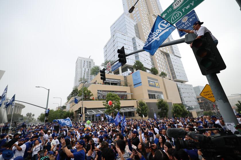 Los Angeles Dodgers' victory parade draws thousands of screaming fans
