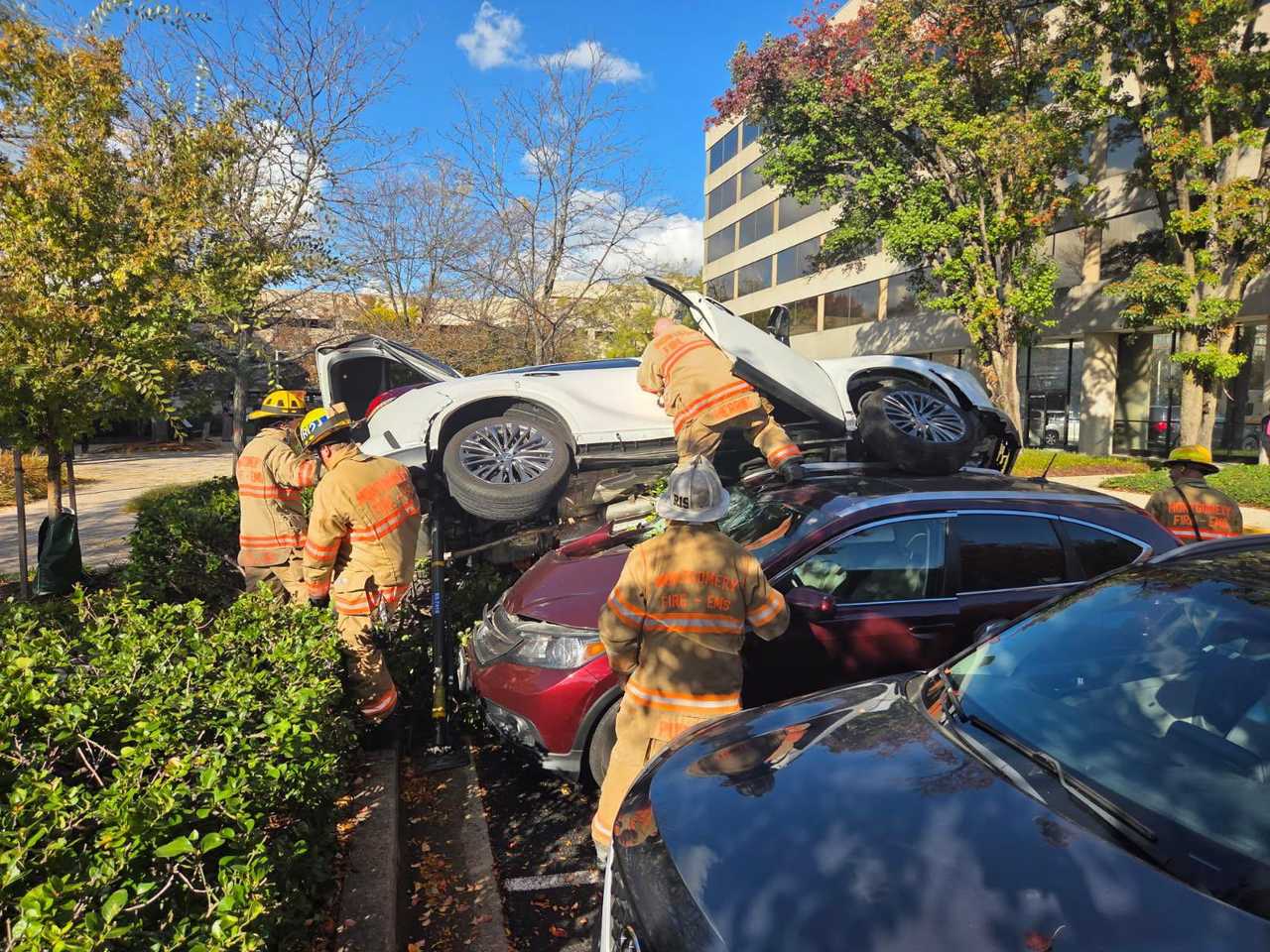 Out-Of-Control EV Launches Onto Two Cars In Maryland Office Lot Crash ...