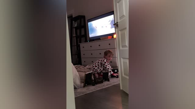 Mom Catches Son Placing Family Photos Around To Watch Movies Together