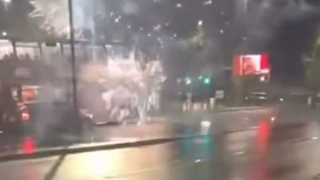 Moment bus comes under attack from yob armed with firework 'rocket ...