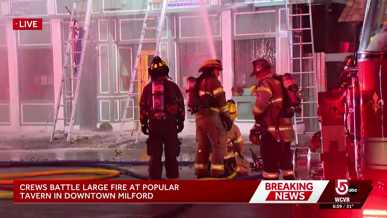Crews battle massive fire at downtown Milford tavern