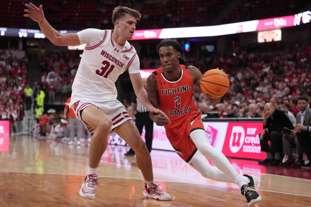 Blackwell scores 31 points as No. 24 Wisconsin opens with 96-64 victory ...
