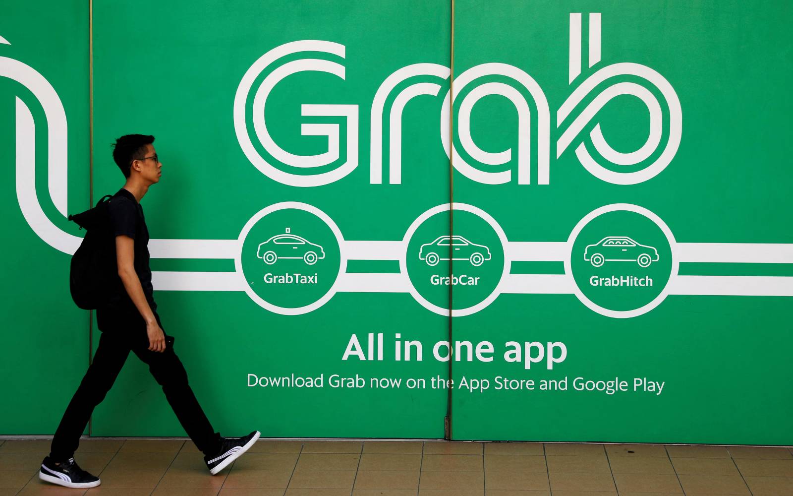 Grab raises earnings forecast as new products help fuel demand
