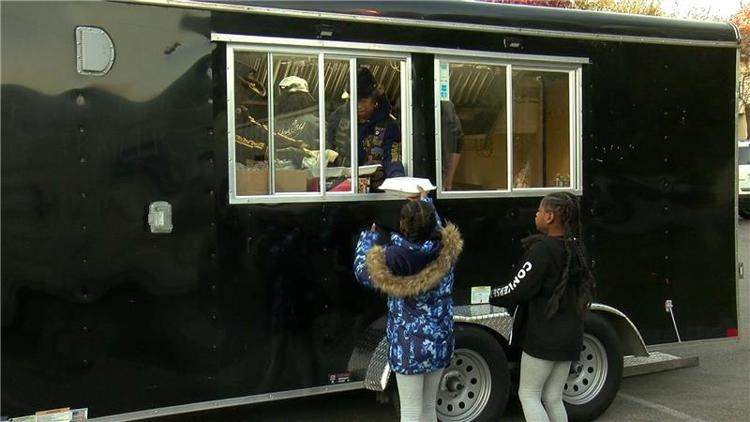 Toledo Buffalo Soldiers serve meals to families amid SNAP uncertainty