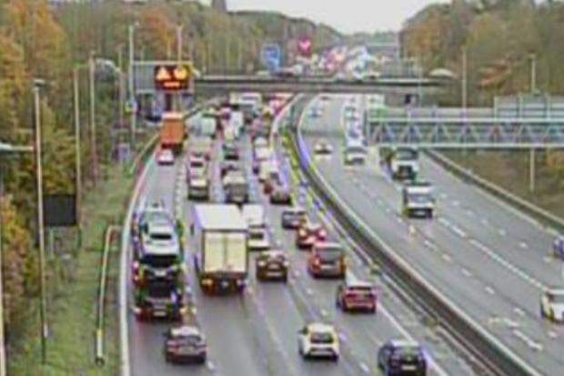 All traffic held and queues building after rush hour crash on M62