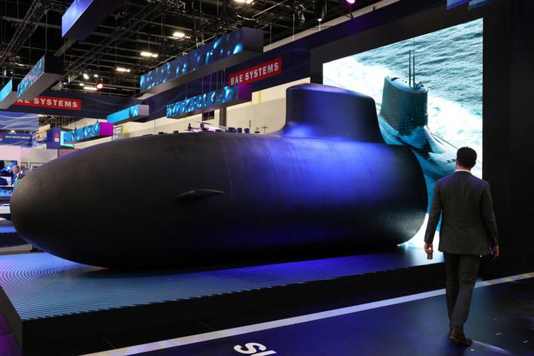 China's military build-up demands response, Australia defence minister says