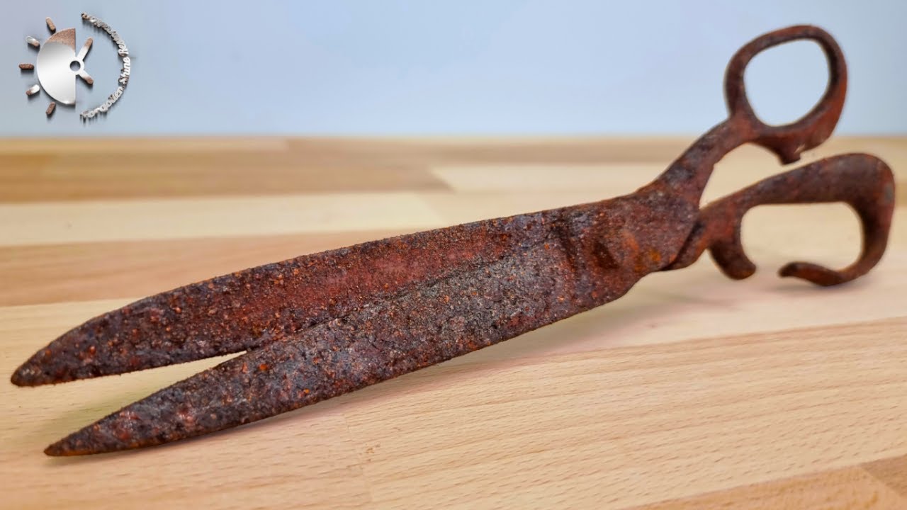 Lemon-powered scissors restoration - sleek black handle and polished finish