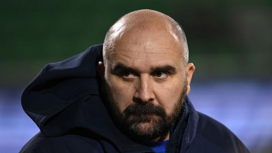 Players in tears as coach dies during match