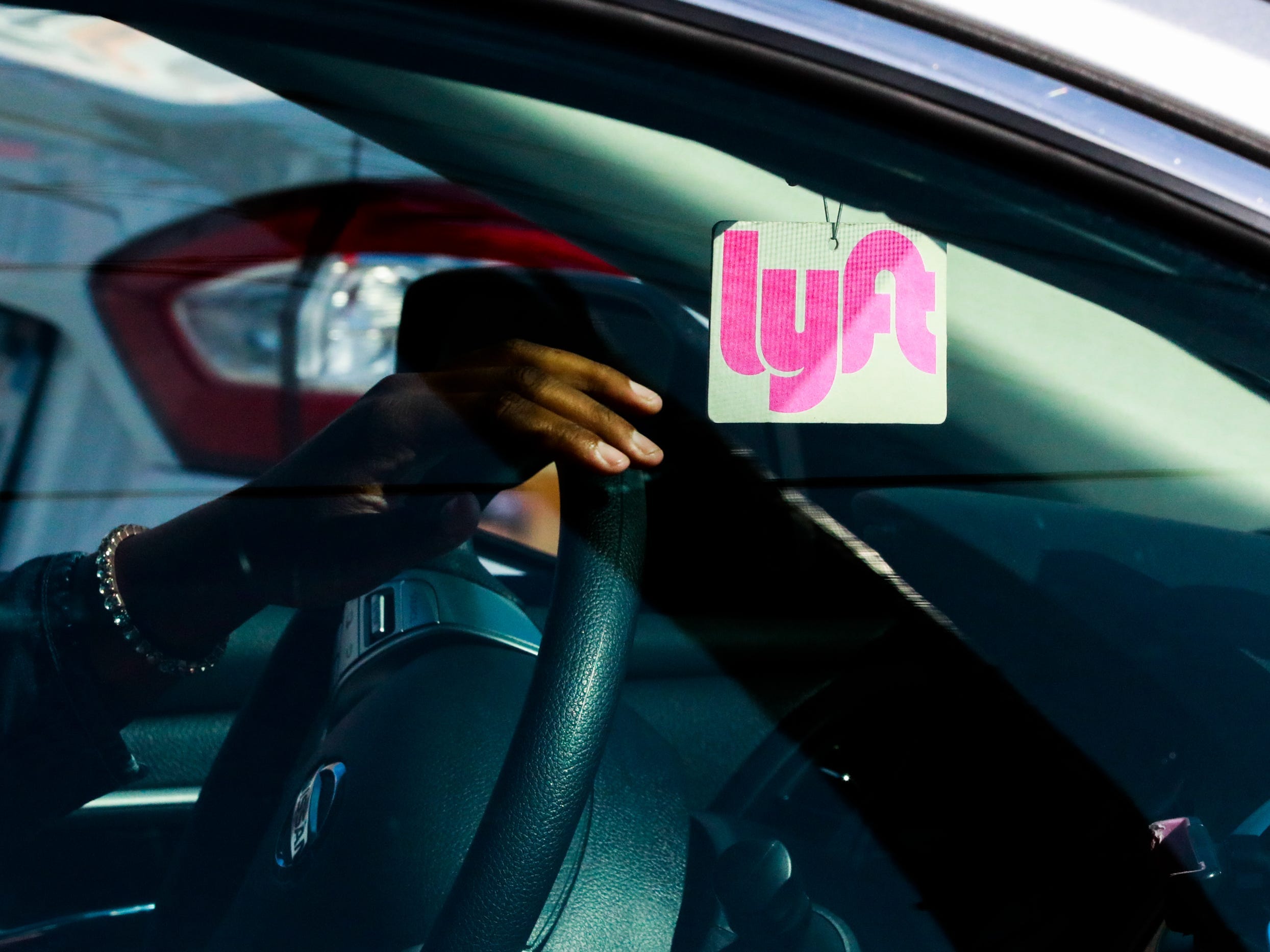 Lyft CEO says robotaxis could create a new role for humans: the 'car ...