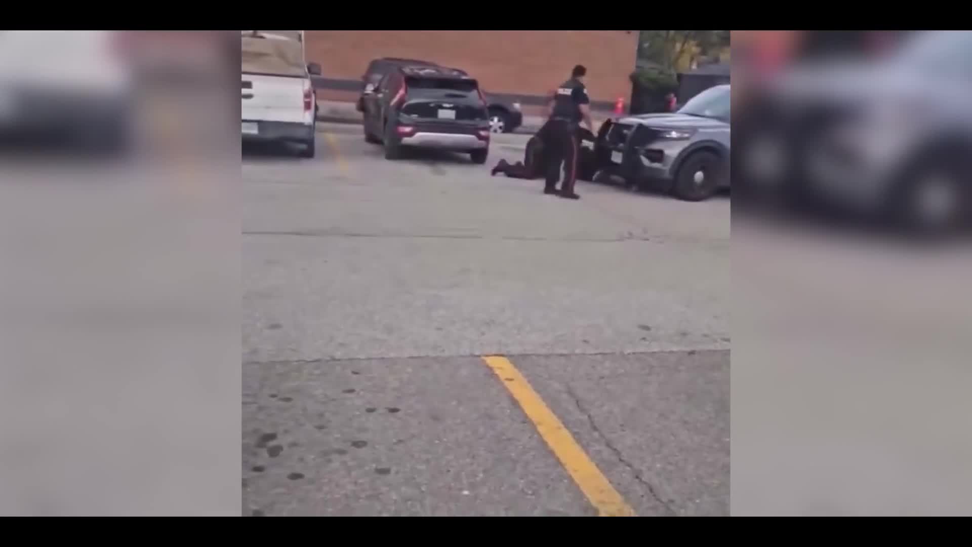 Video shows Toronto police officer running over suspect