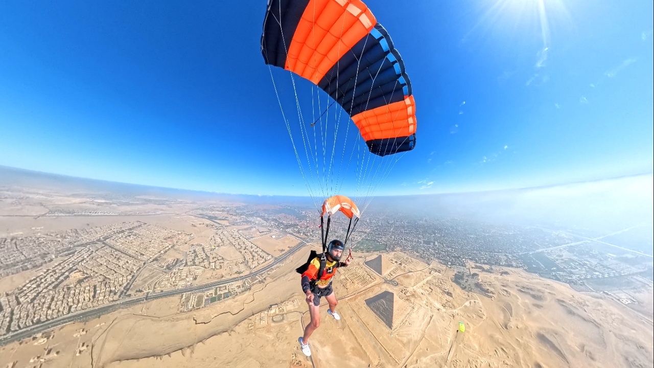 Stunning aerial view of the pyramids during skydiving festival in Cairo ...