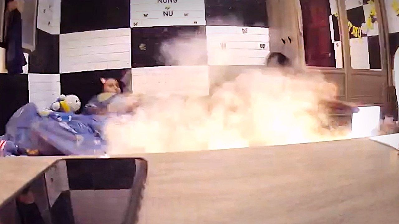 Terrifying moment power bank explodes beside couple's bed