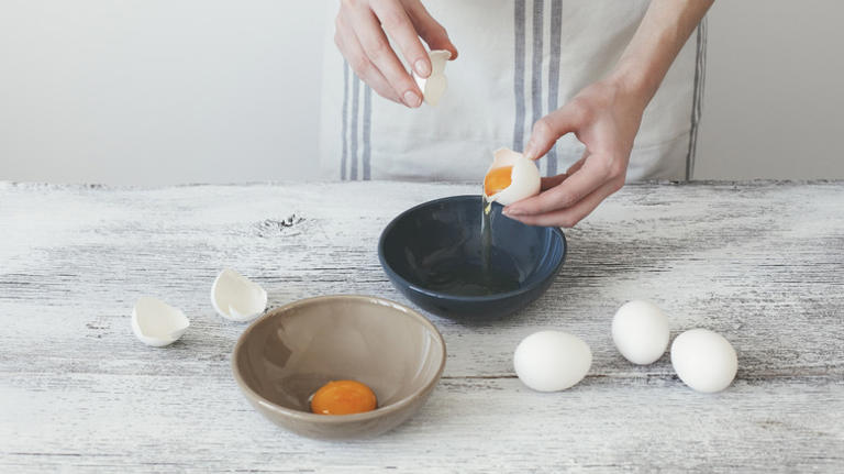 Here's Why There's Stringy White Stuff On Your Egg Yolks