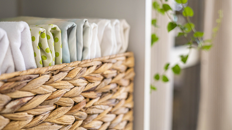 Save Linen Closet Space & Use This Sleek Storage Method To Elevate Your ...