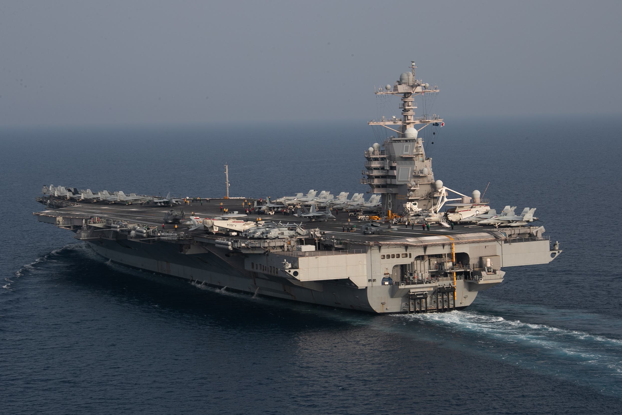 Photos show fully stacked US carrier strike group heading to Caribbean