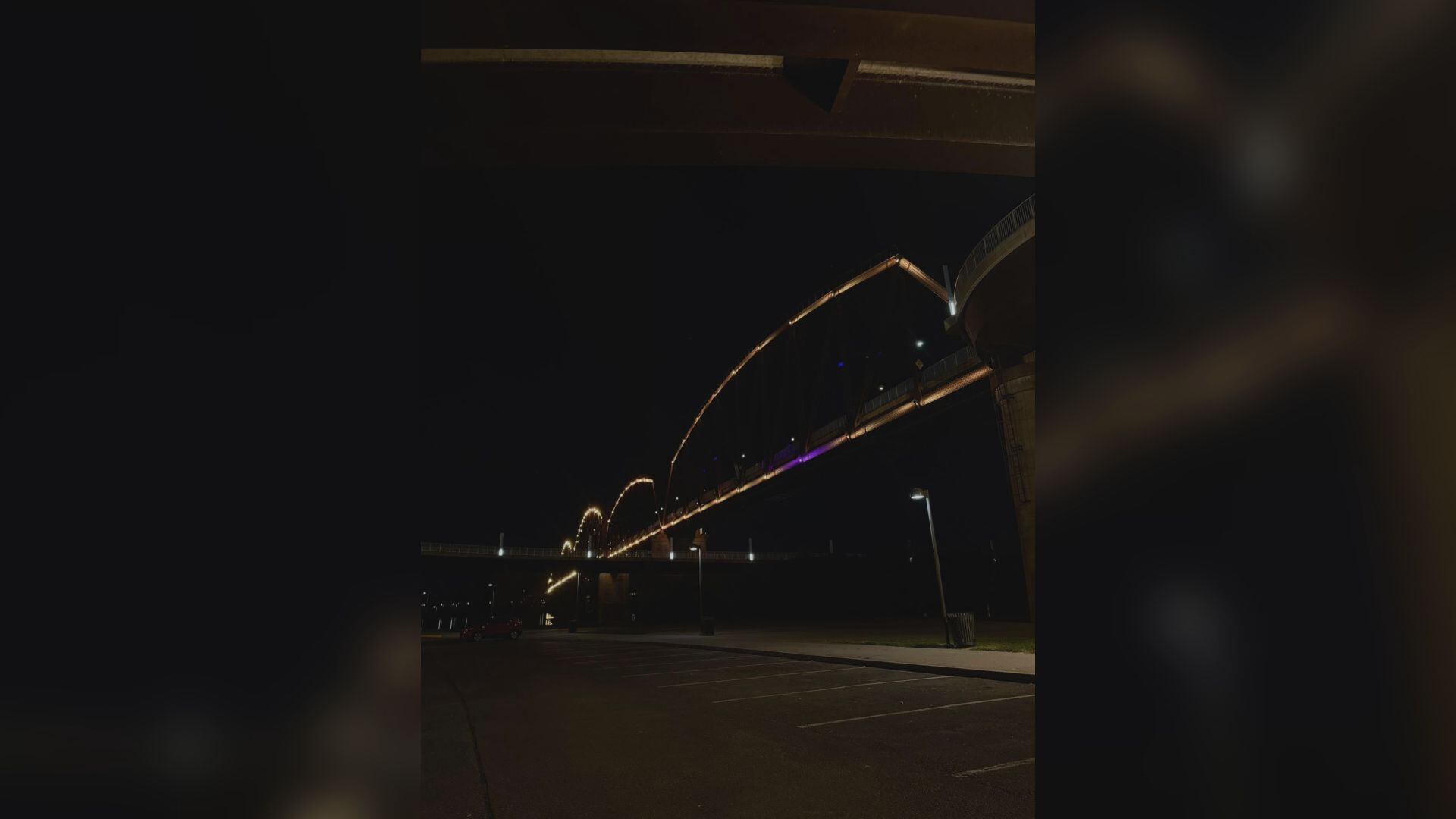 Big Four Bridge lit up yellow in honor of UPS plane crash