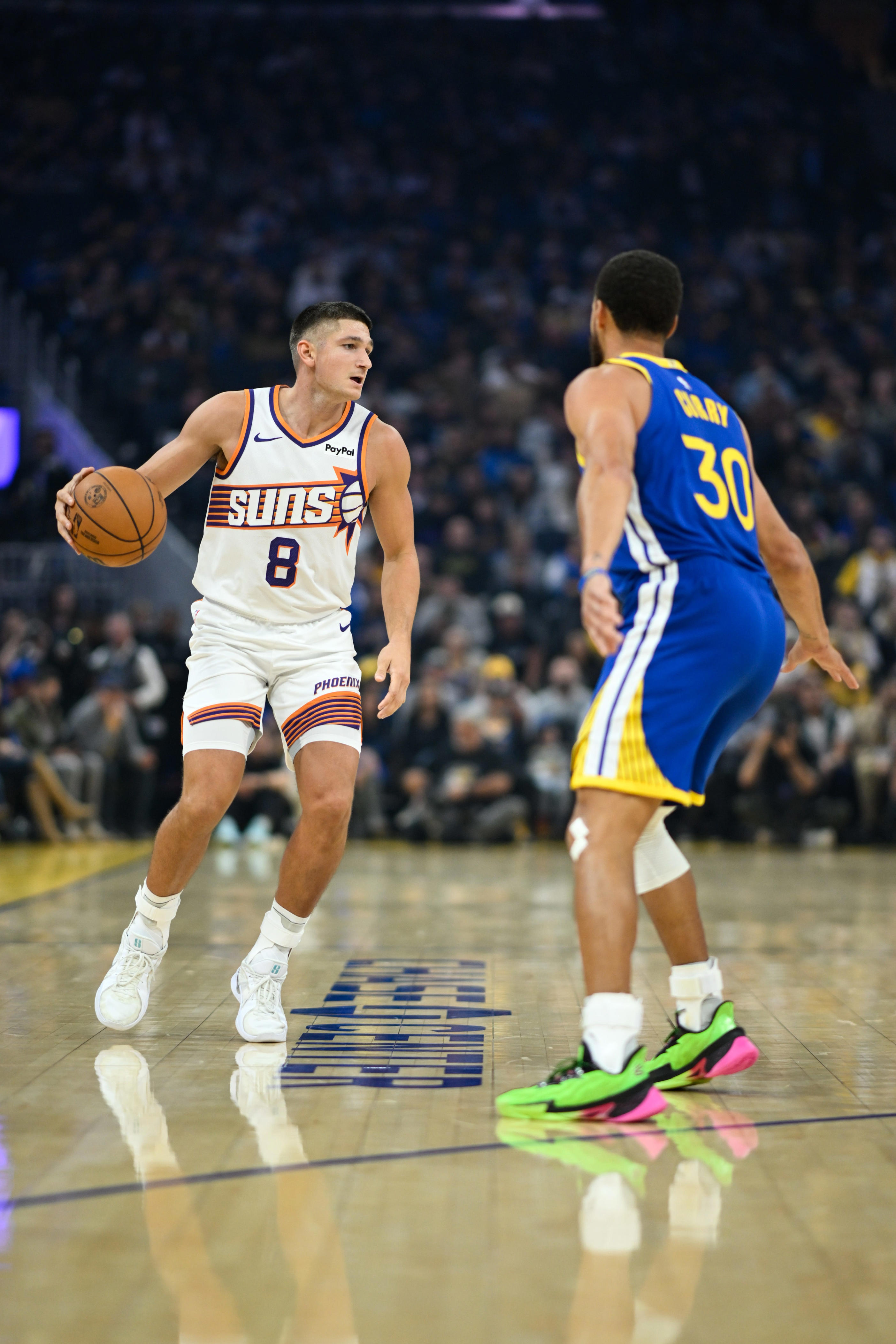 Devin Booker, Phoenix Suns stay winless on road, fall to Golden State ...