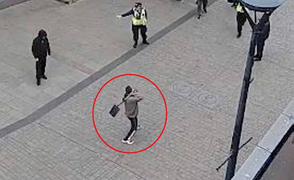 Thug who went berserk with a spade in busy city centre is jailed