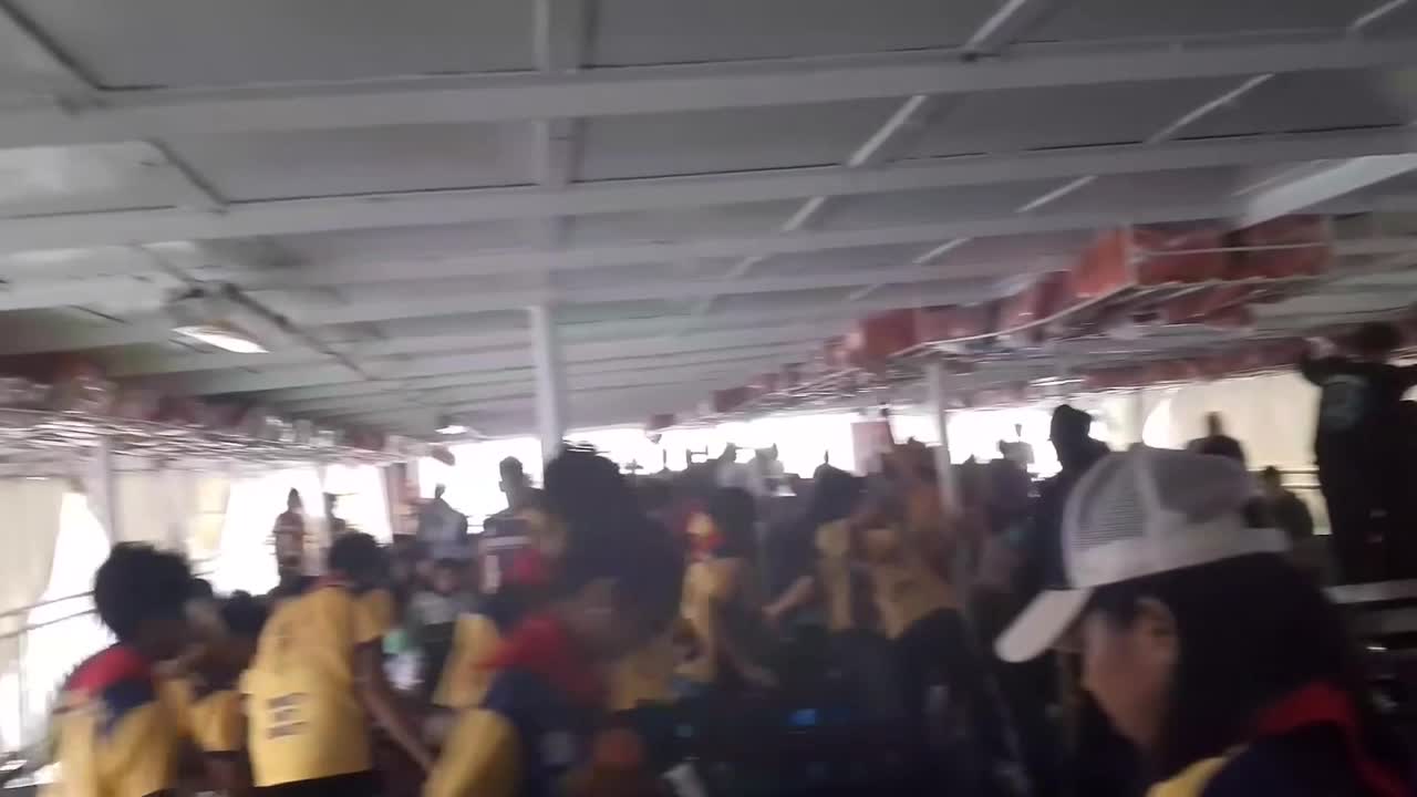 Passengers cling to ferry ceiling as storm pounds vessel in the Philippines