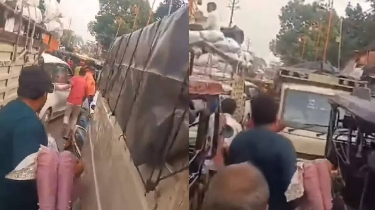 Trapped in gridlock, helpless father walks with sick child in arms; UP ...