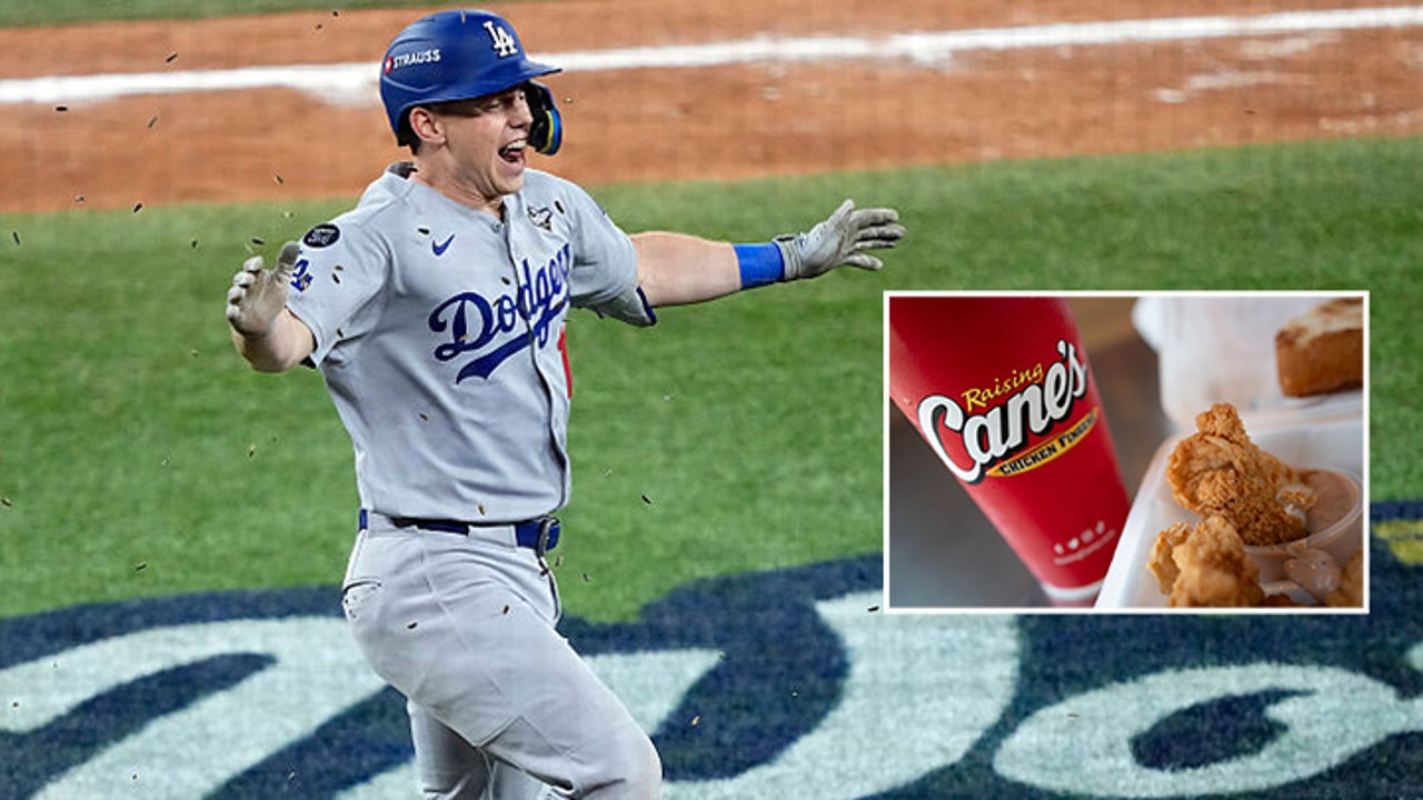 Dodgers' Will Smith works celebratory 'shift' at Raising Cane's in ...