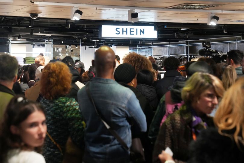 Protesters carry 'Shame on Shein' signs as fast fashion brand opens ...