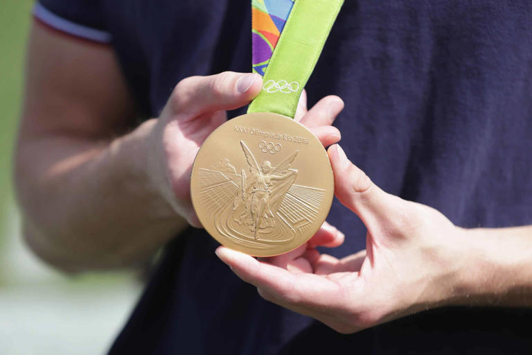 A Visual Journey of Olympic Medal Designs Through the Years
