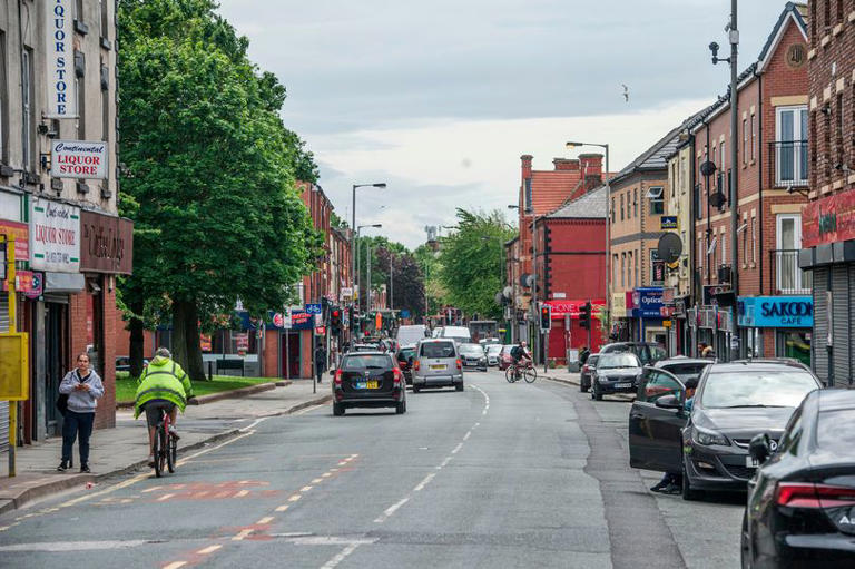 Police close major road after man hit by car