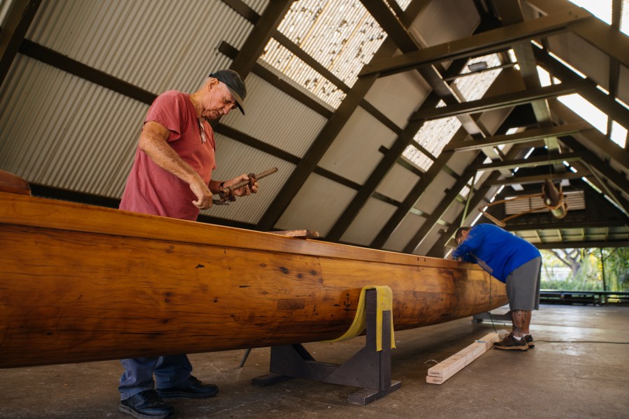 Fabled koa canoe returns to the ocean, shaper returns to his roots