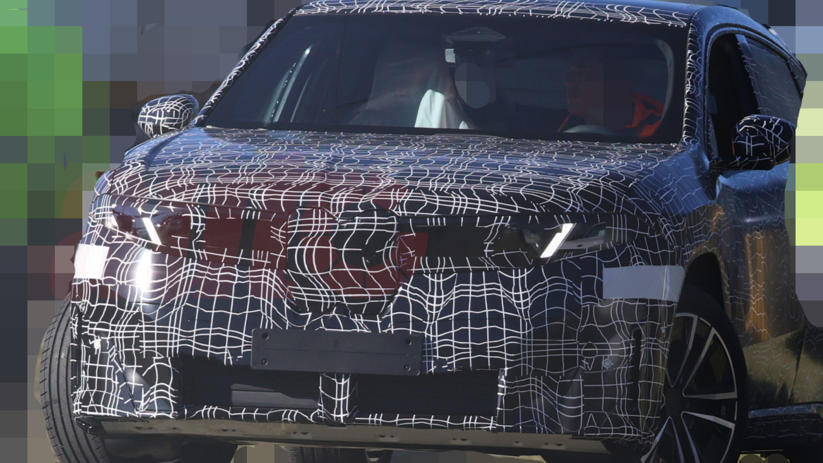 First Look: BMW’s All-New iX4 Electric SUV Spied Testing