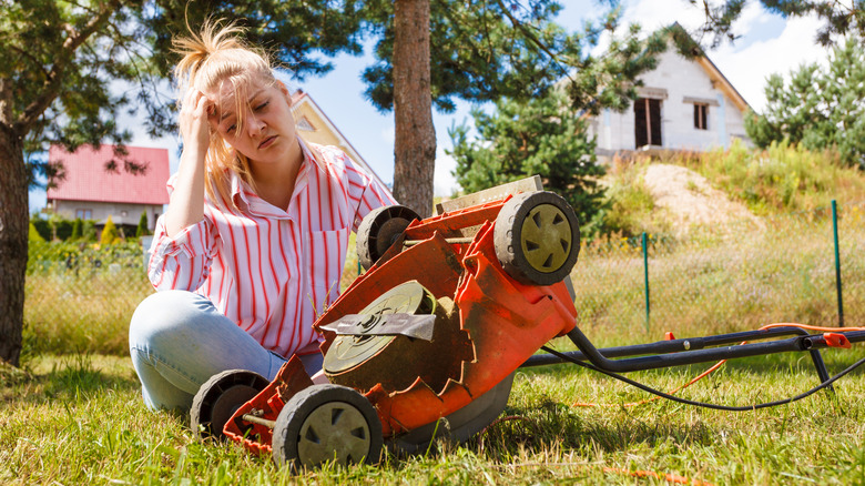 How To Fix Your Lawn Mower After Hitting A Rock With It