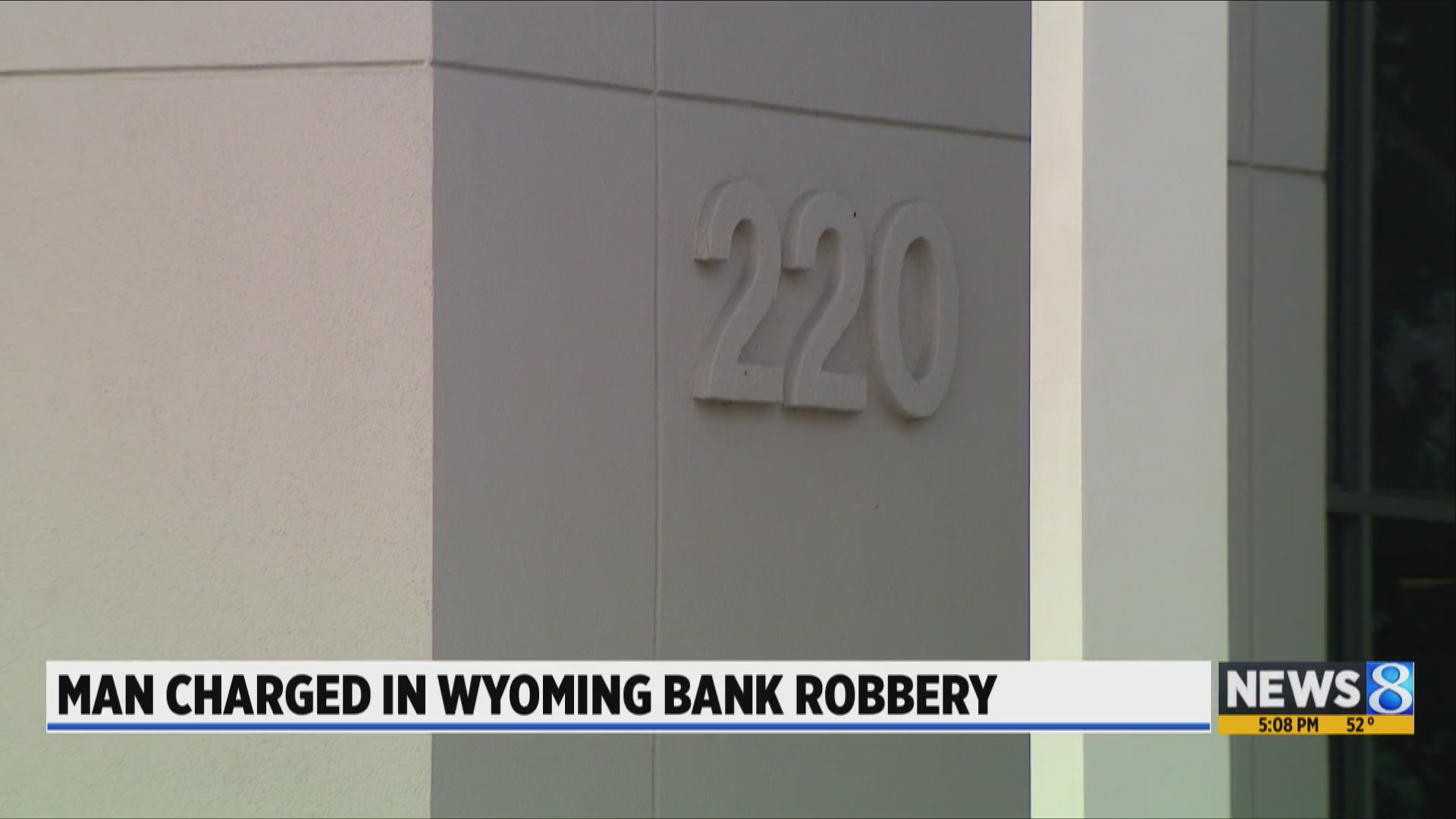 Olive hoodie and $505: Man charged with robbing Wyoming bank