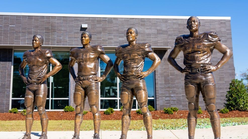 Tuscaloosa unveils statue honoring 'Marshall Four' athletes
