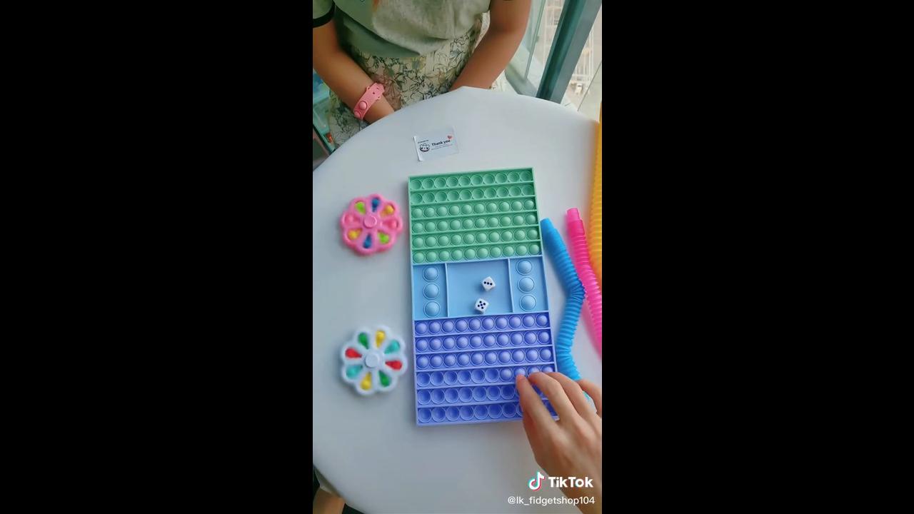 Playing Board Game With Pop It