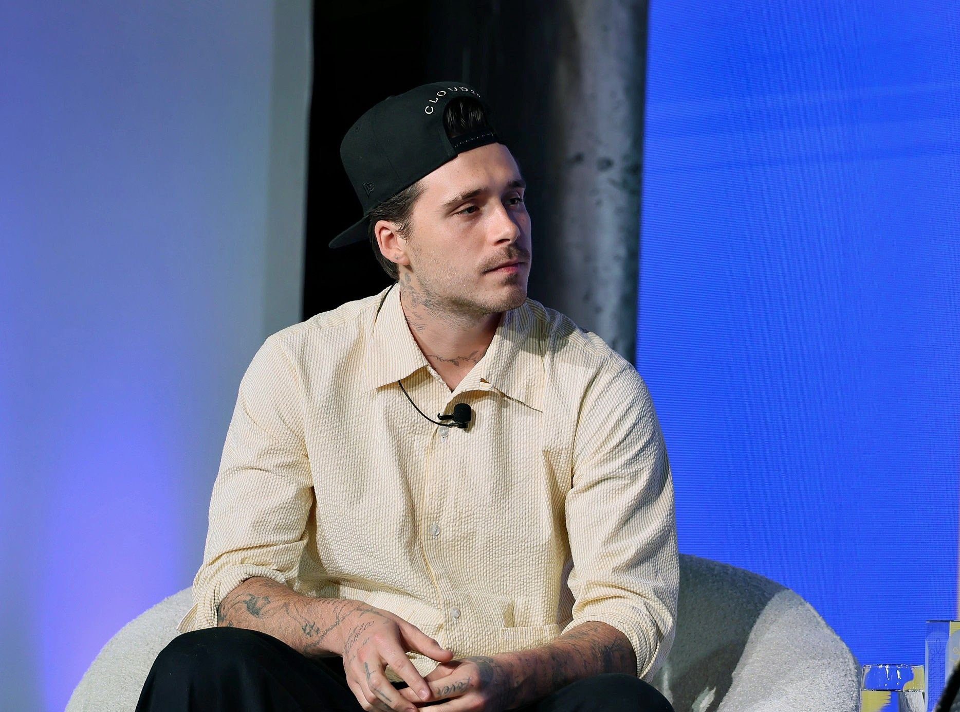 Brooklyn Beckham under fire for missing dad's big day