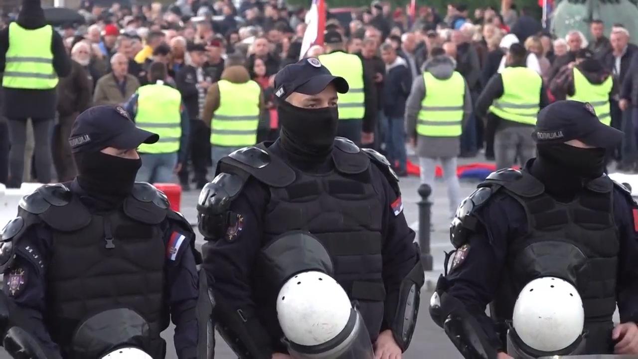 Serbian police face off with anti-government protesters outside ...