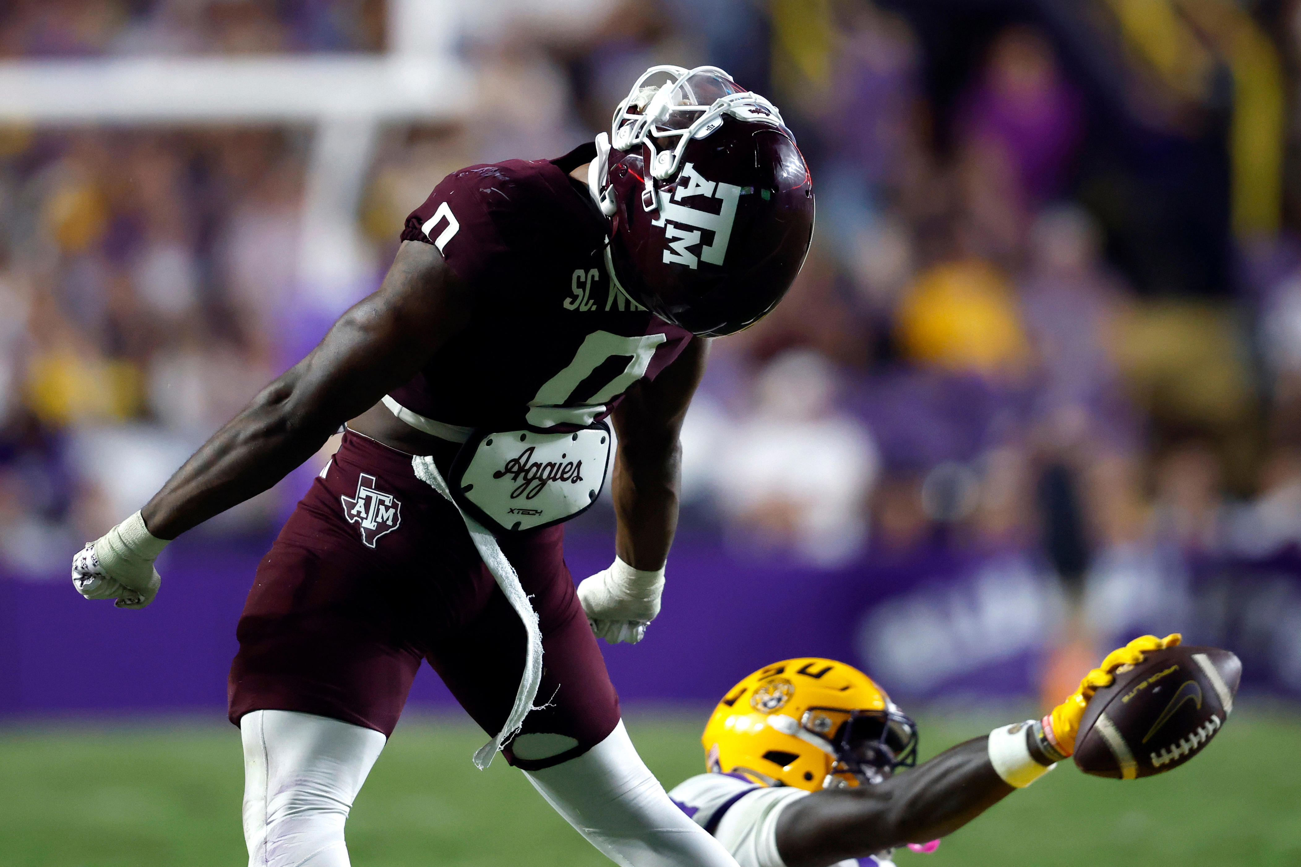Texas A&M DC Jay Bateman discusses star LB's likely return in the CFP