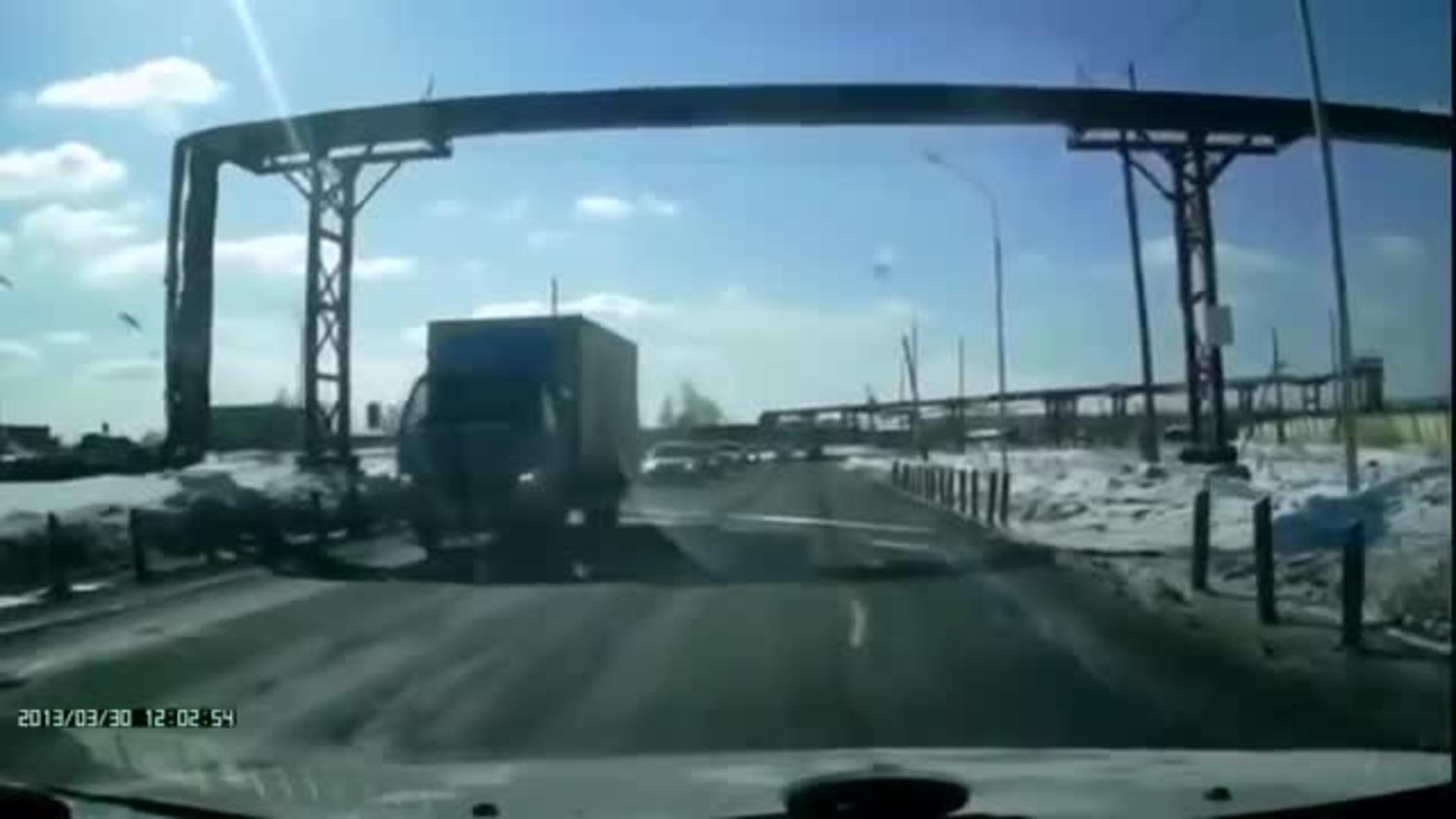 Dashcam Tank Rolls across Road