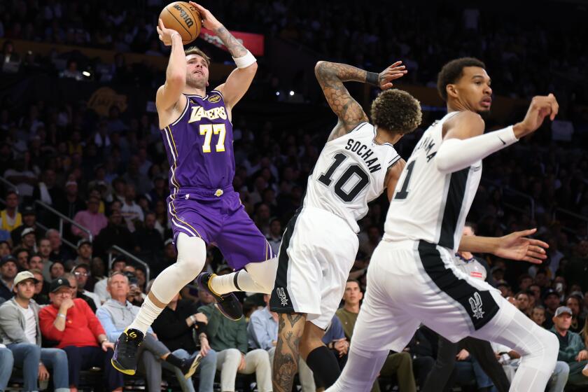 Luka Doncic scores 35 points as Lakers win foul-filled game over Spurs