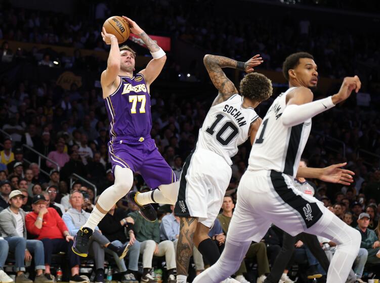 Luka Doncic scores 35 points as Lakers win foul-filled game over Spurs
