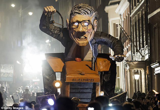 Keir Starmer effigy is dragged through the streets as PM is mocked at ...