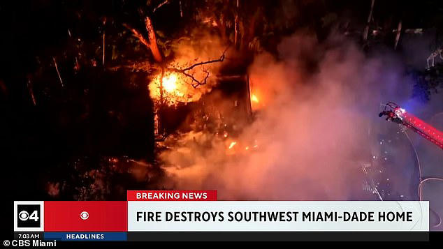 Distraught NBA coach watches on helplessly as his home burns to the ground in huge overnight fire