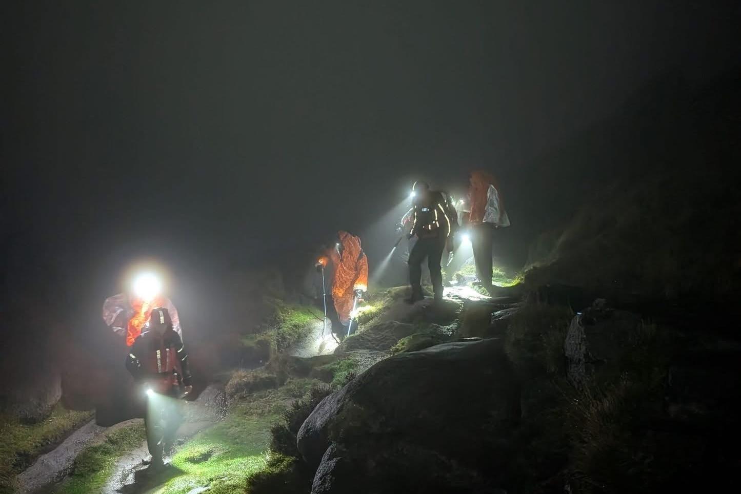 Peak District walkers rescued after getting lost and sinking waist deep ...