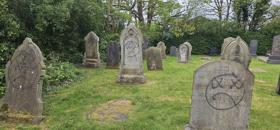 Man jailed after spraying vile graffiti on gravestones and walls of church