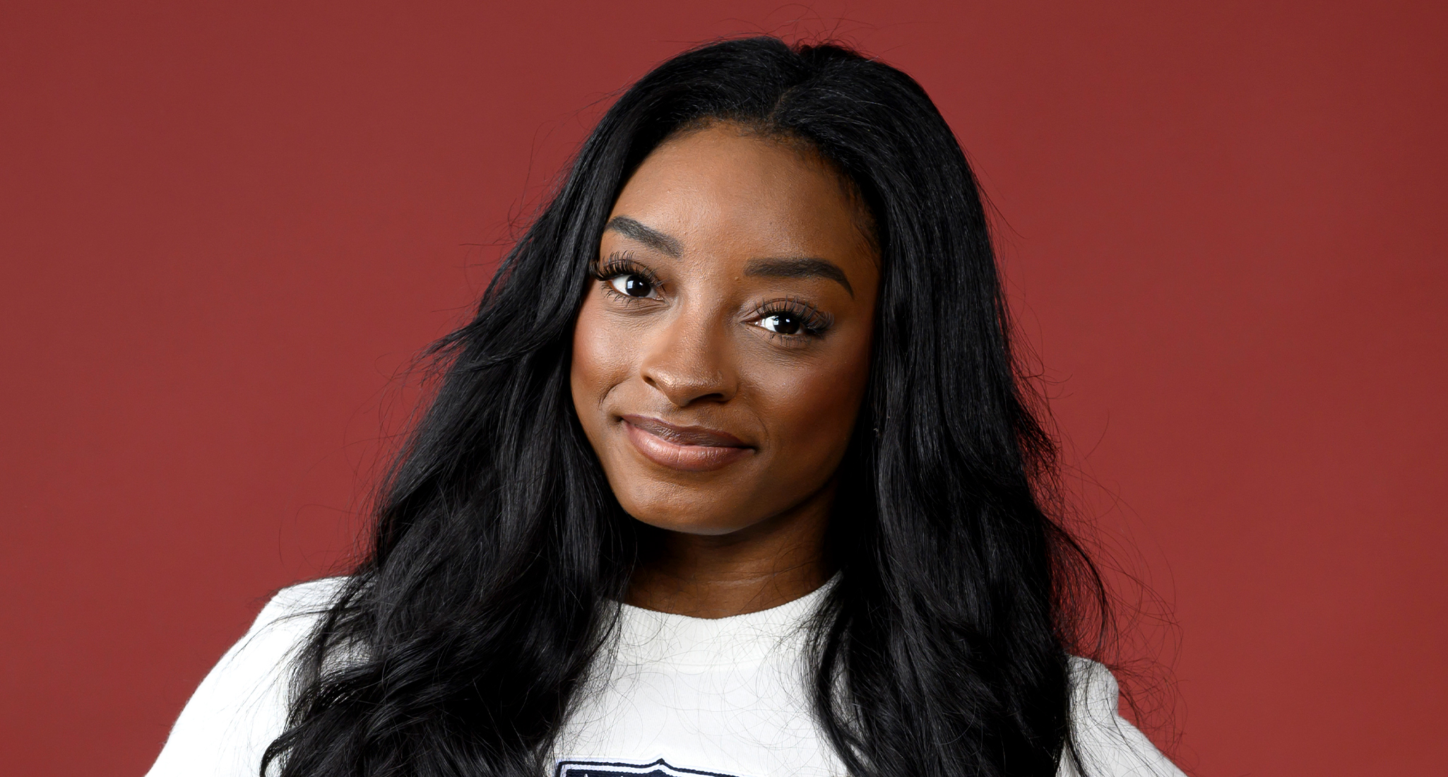 Simone Biles's Burgundy Trench Is the Definition of Fall Chic